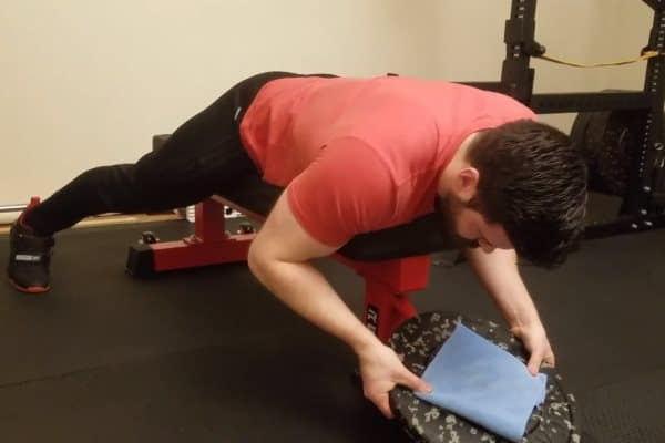 Weighted Lying Neck Extension Exercise Form Guide with Video & Pictures