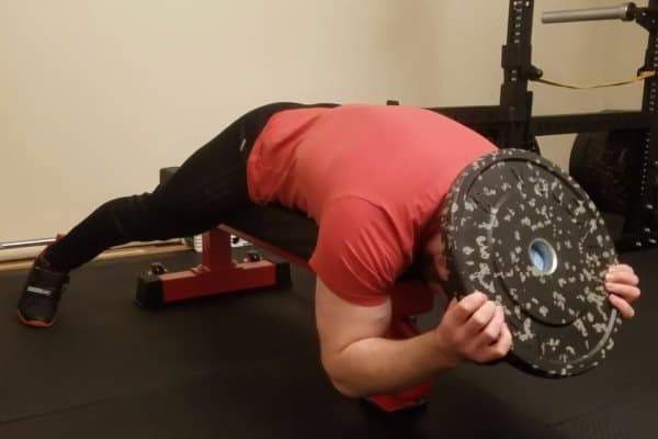Weighted Lying Neck Extension Exercise Form Guide with Video & Pictures